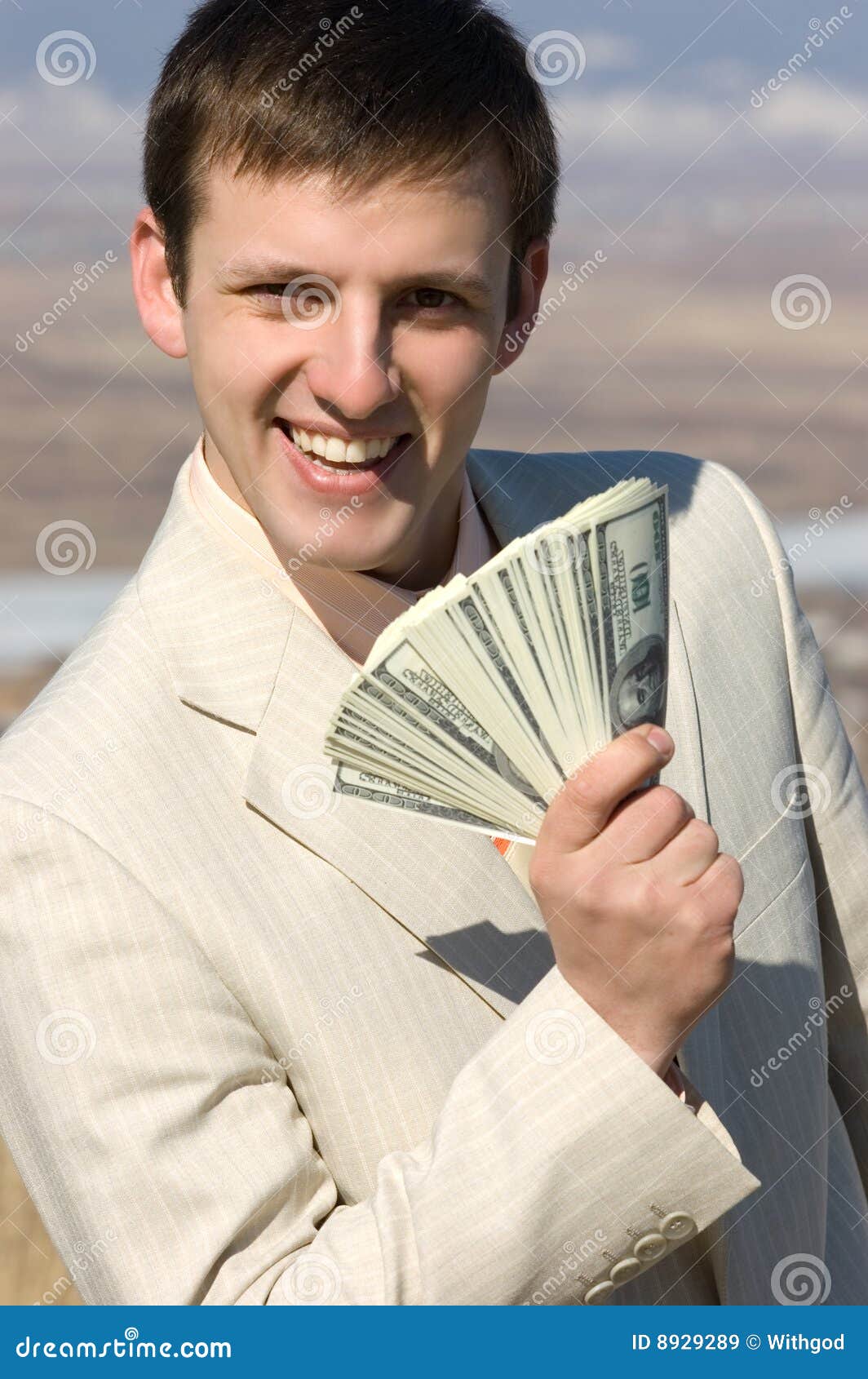 Smiling Businessman with Batch of Dollars Stock Image - Image of ...