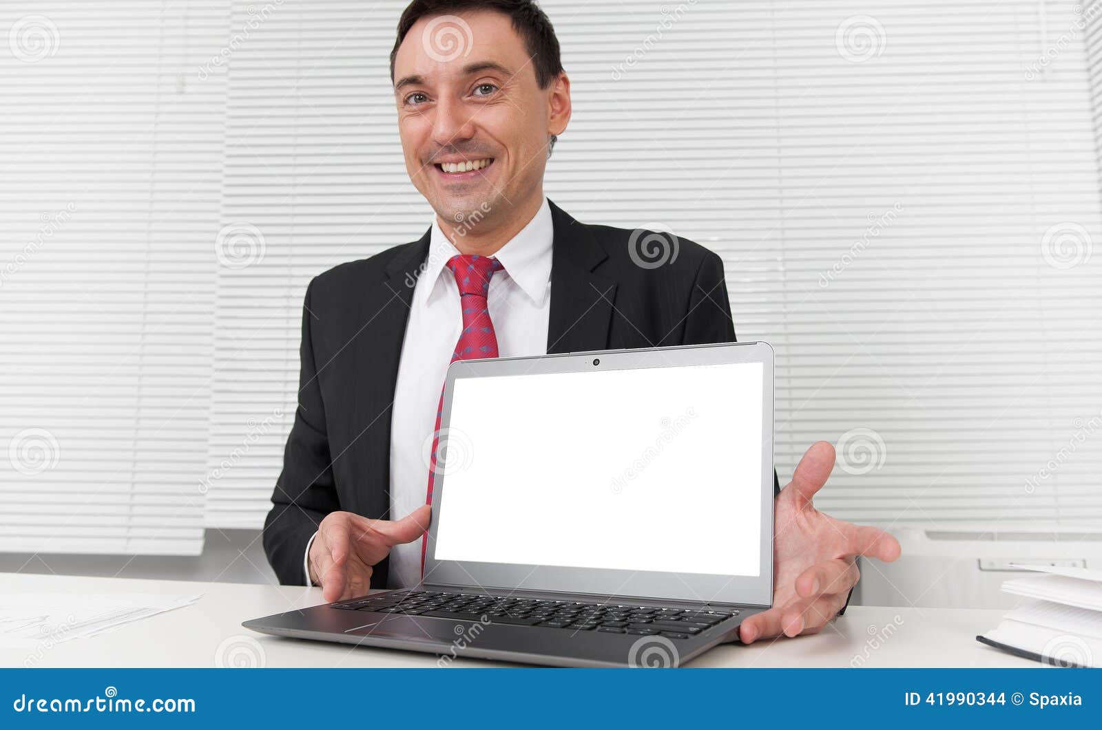 Smiling Businessman with Blank Laptop Screen Stock Photo - Image of ...