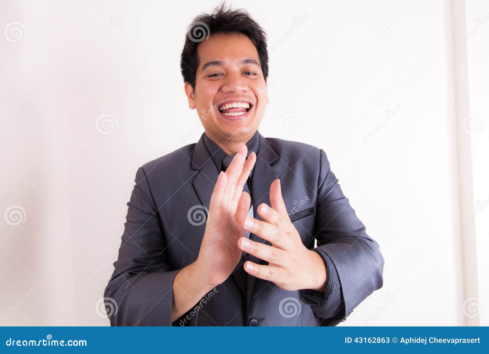 Smiling Businessman Clapping His Hands Stock Image - Image of agreement ... Smiling Businessman Clapping His Hands Stock Image - Image of agreement ...