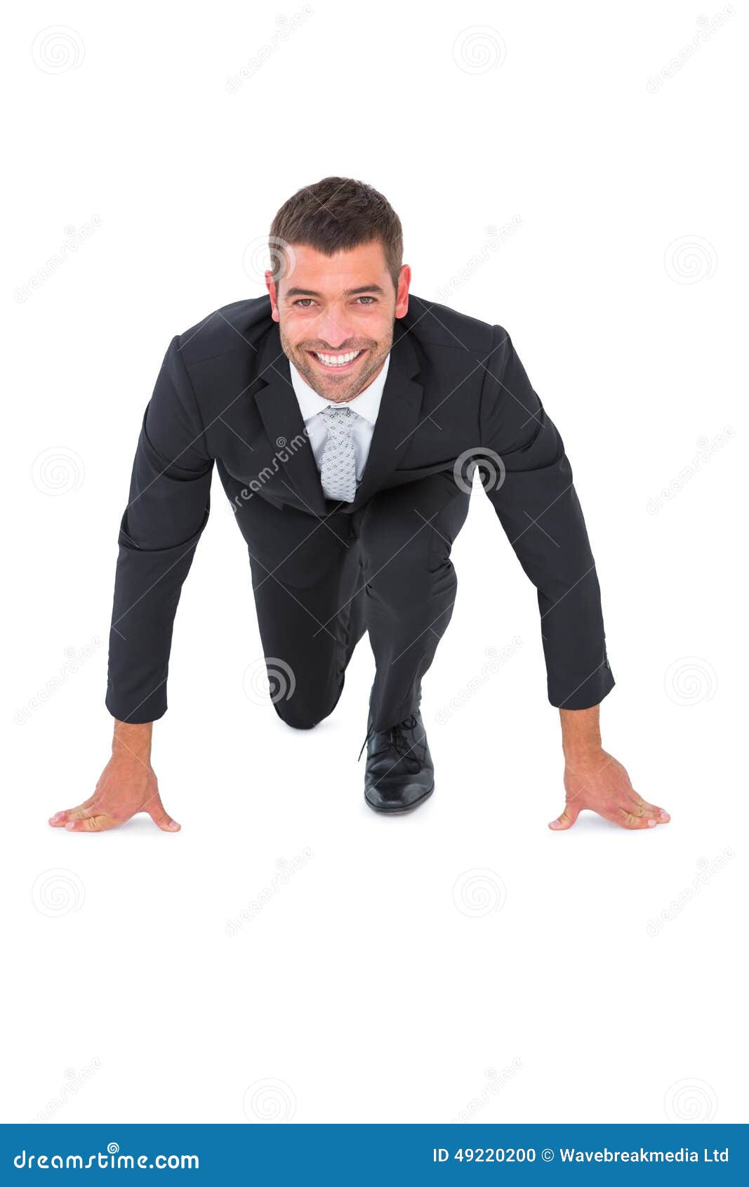 Smiling Businessman Crouching Stock Photo - Image of stylish, jacket ...
