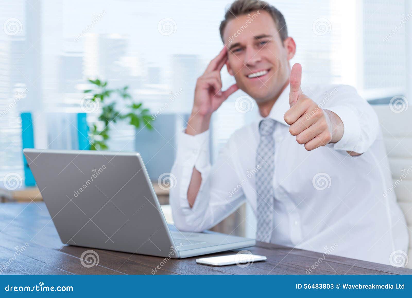 Smiling Businessman Gesturing Thumbs Up Stock Image - Image of indoors ... Smiling Businessman Gesturing Thumbs Up Stock Image - Image of indoors ...
