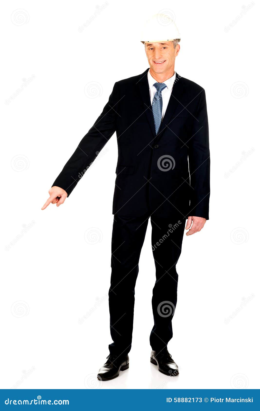 Smiling Businessman with Hard Hat Pointing Down Stock Image - Image of ...