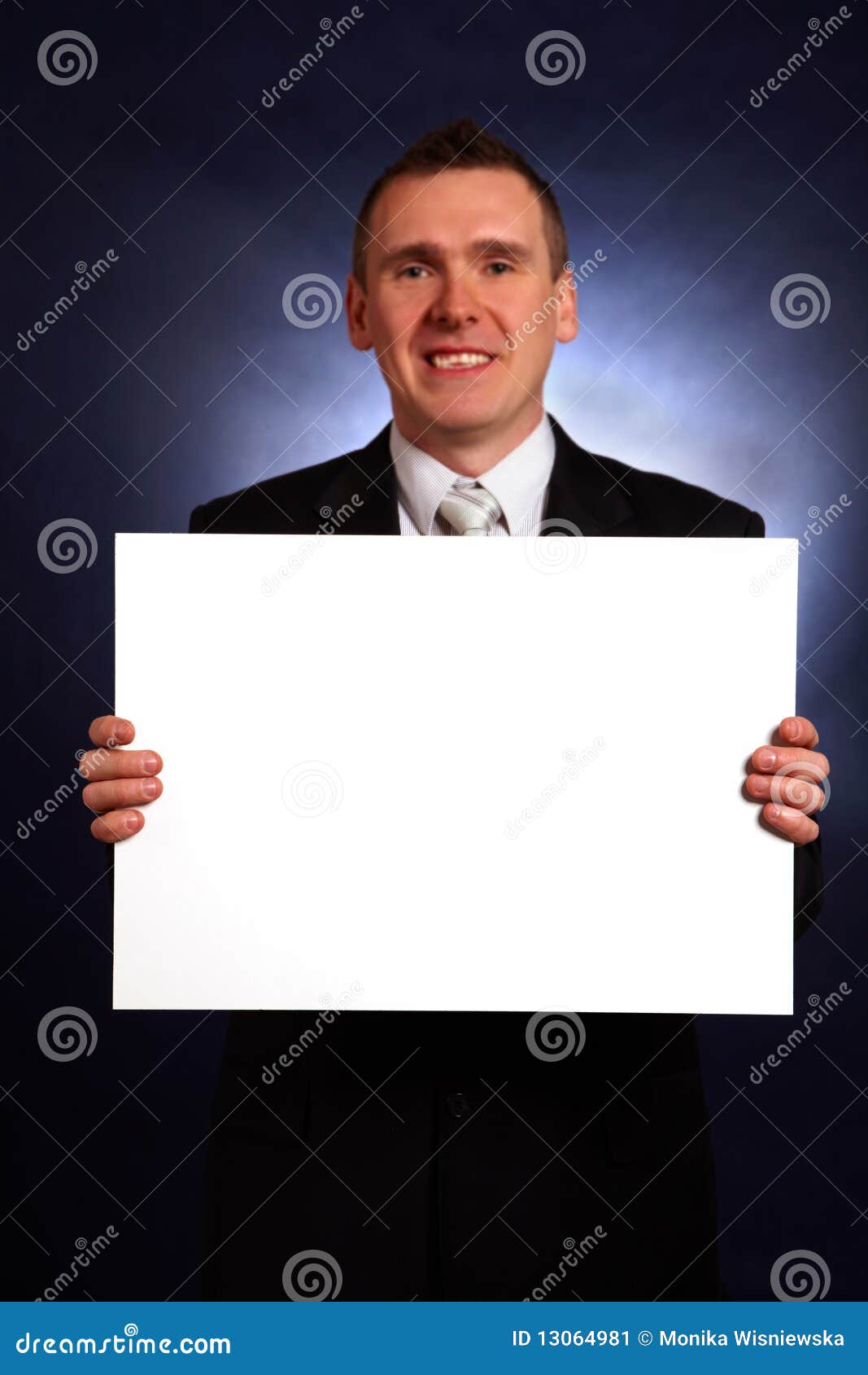 Smiling Businessman Holding a Big Blank Card Stock Image - Image of ...