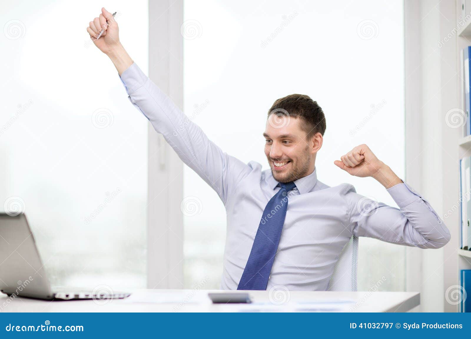 Smiling Businessman with Laptop and Documents Stock Image - Image of ...