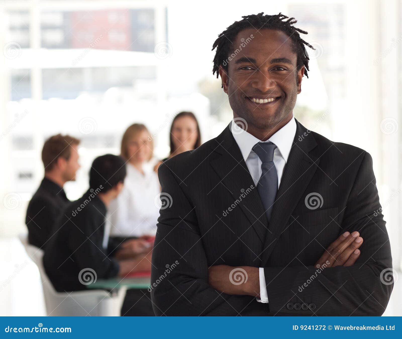 Smiling businessman leader stock photo. Image of group - 9241272