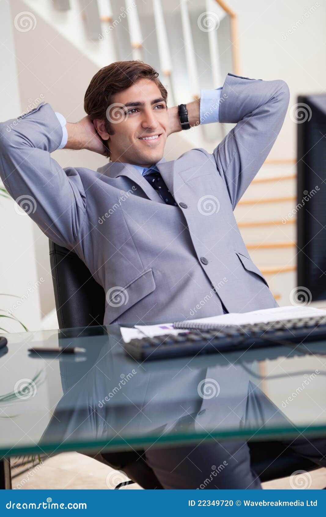 Smiling Businessman Leaning Back in His Office Stock Photo - Image of ...