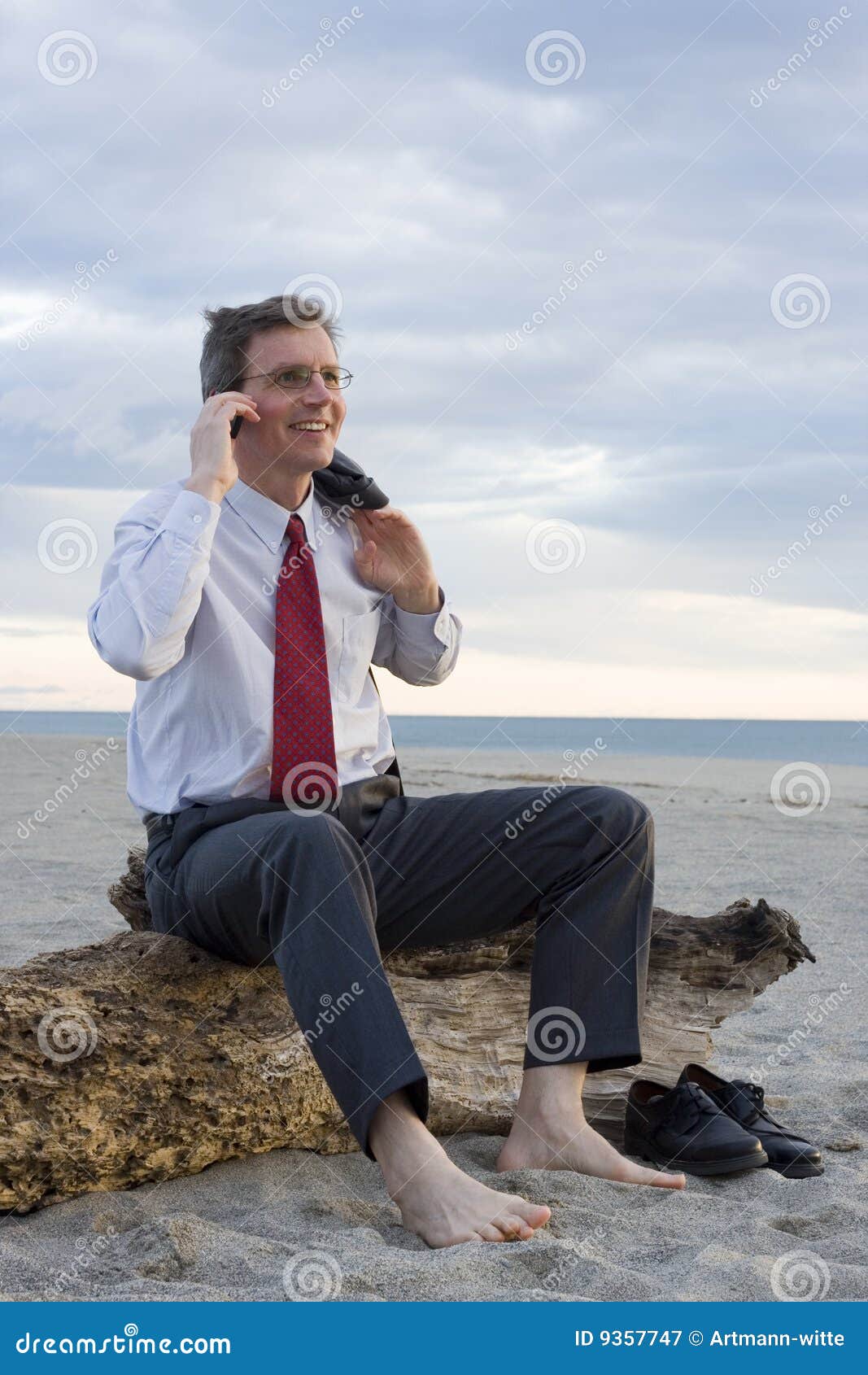 Smiling Businessman Making a Phone Call on a Beach Stock Image - Image ...