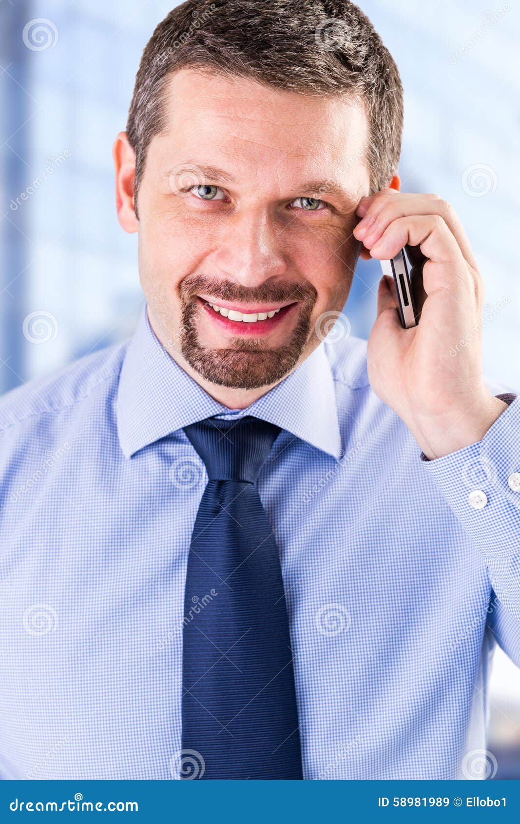 Smiling Businessman Making a Phone Call. Stock Image - Image of ...