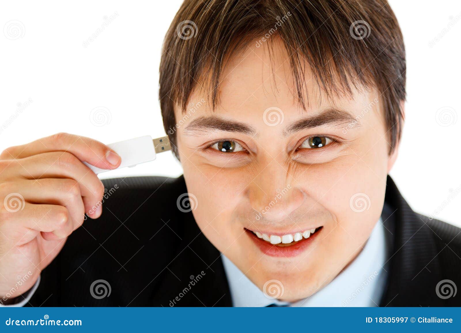 Smiling Businessman Plugging Flash Drive into Head Stock Image - Image ...