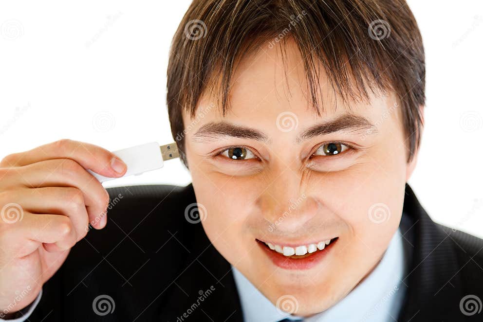 Smiling Businessman Plugging Flash Drive into Head Stock Image - Image ...