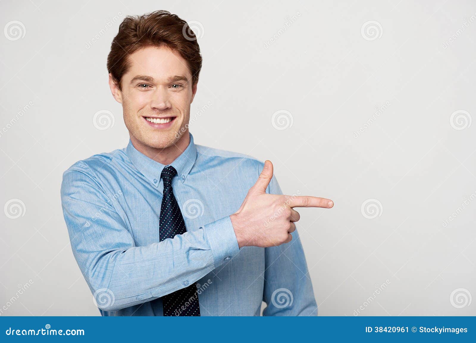 Smiling Businessman Pointing Away Stock Image - Image of model ...