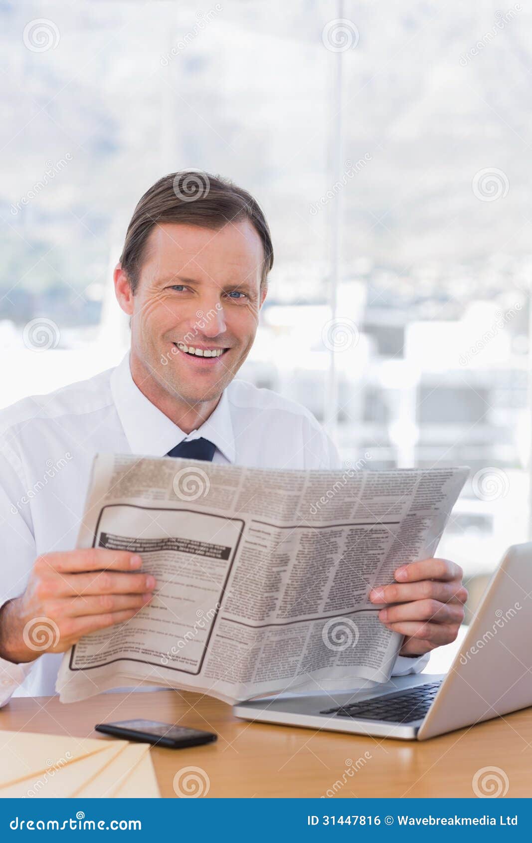 Smiling Businessman Reading a Newspaper Stock Photo - Image of cheerful ...