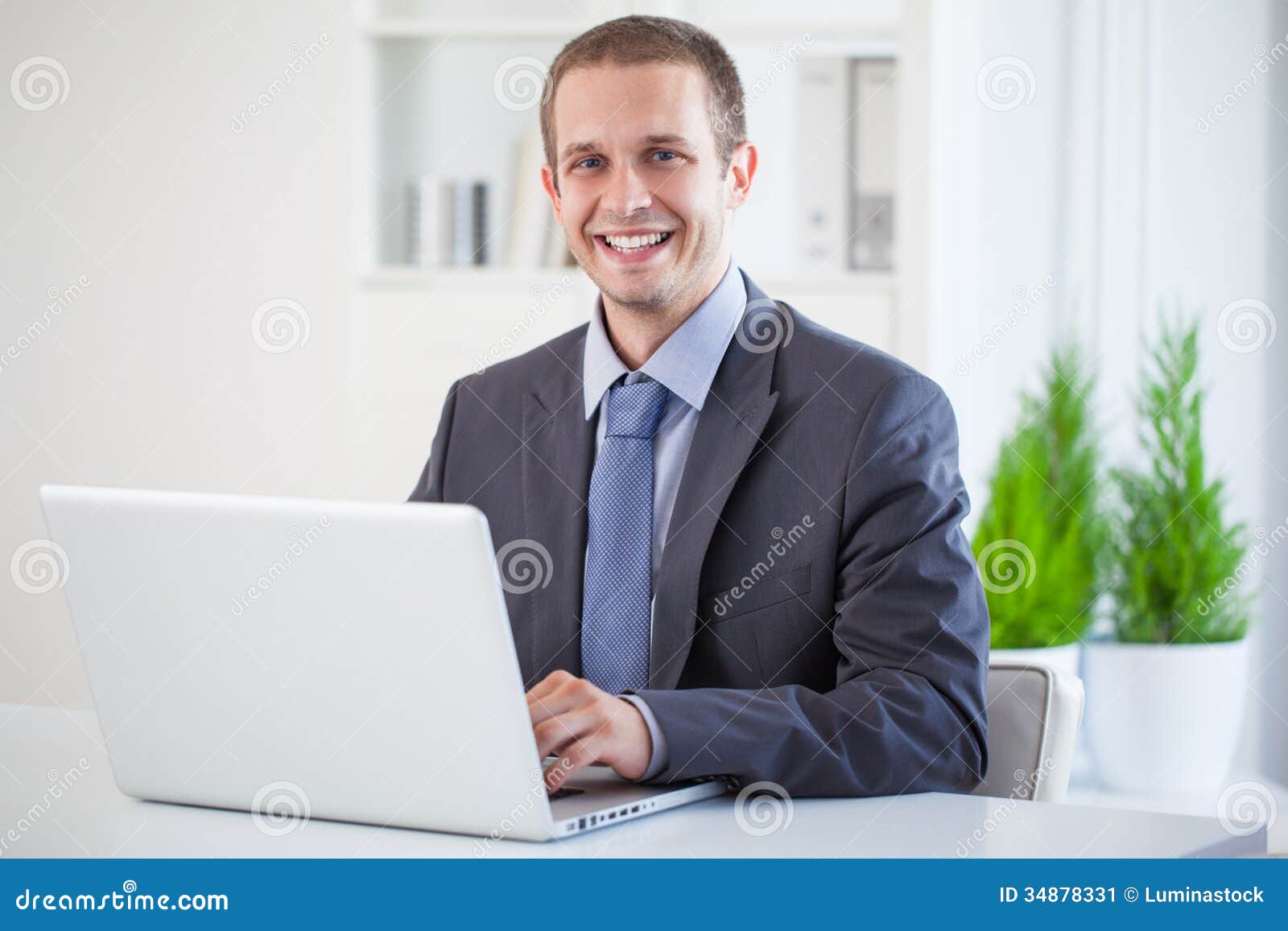 Smiling Businessman Sitting at His Laptop Stock Image - Image of ... Smiling Businessman Sitting at His Laptop Stock Image - Image of ...
