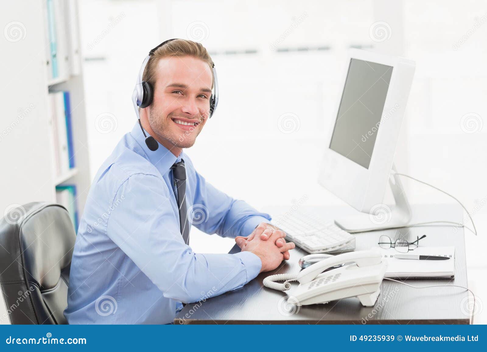 Smiling Businessman Speaking with Headset Stock Image - Image of office ...