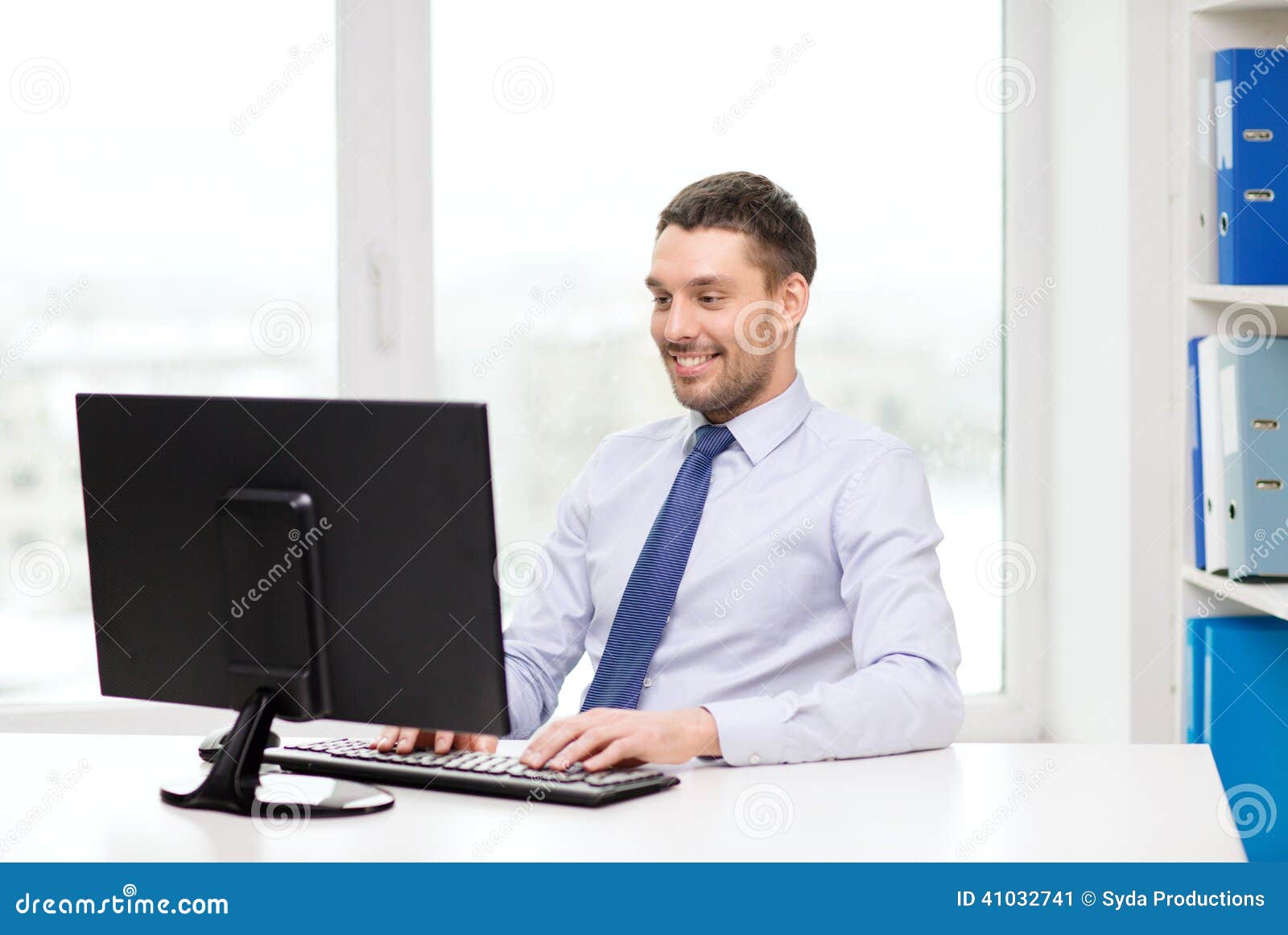 Smiling Businessman or Student with Computer Stock Image - Image of ...