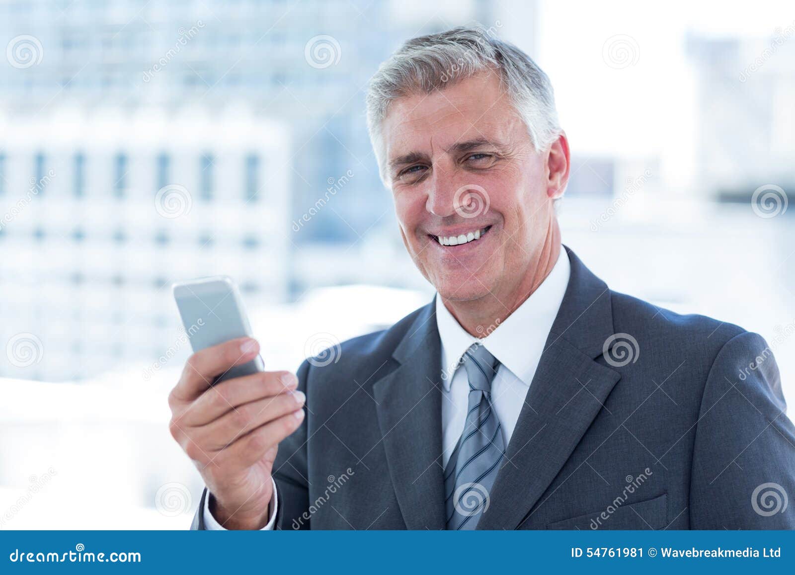 Smiling Businessman Using His Smartphone Stock Image - Image of ...