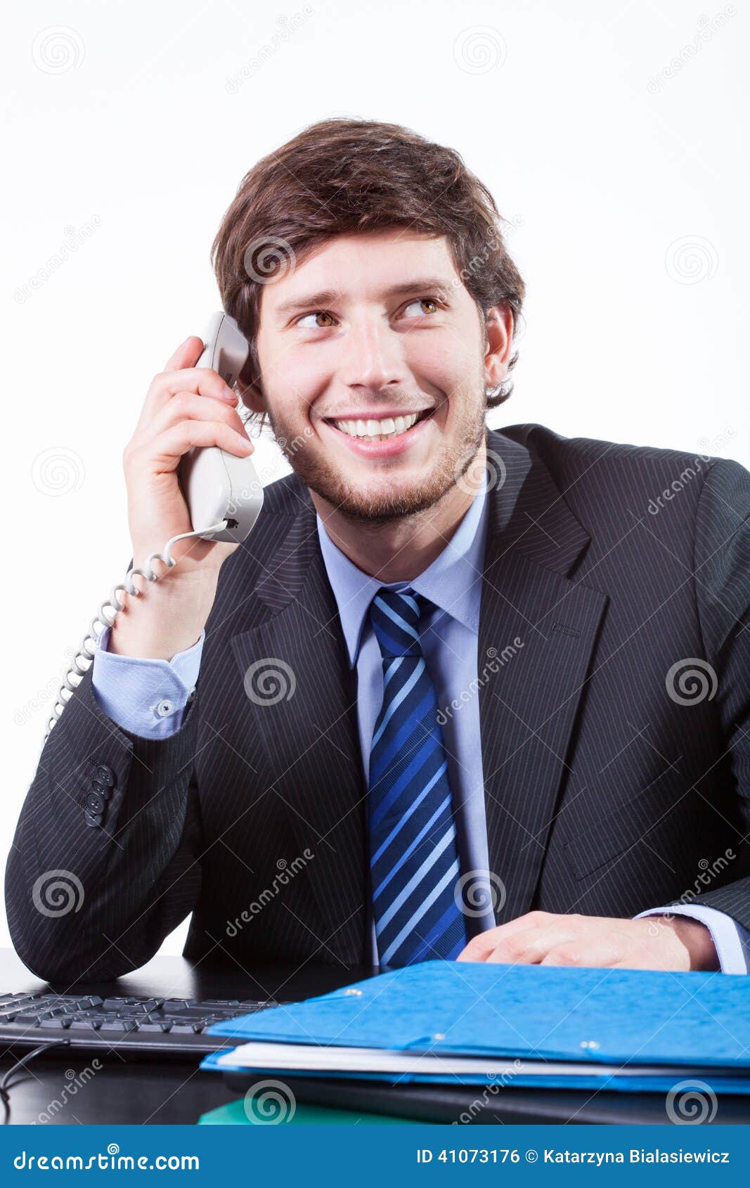 Smiling Businessman Using Phone in Office Stock Photo - Image of ...