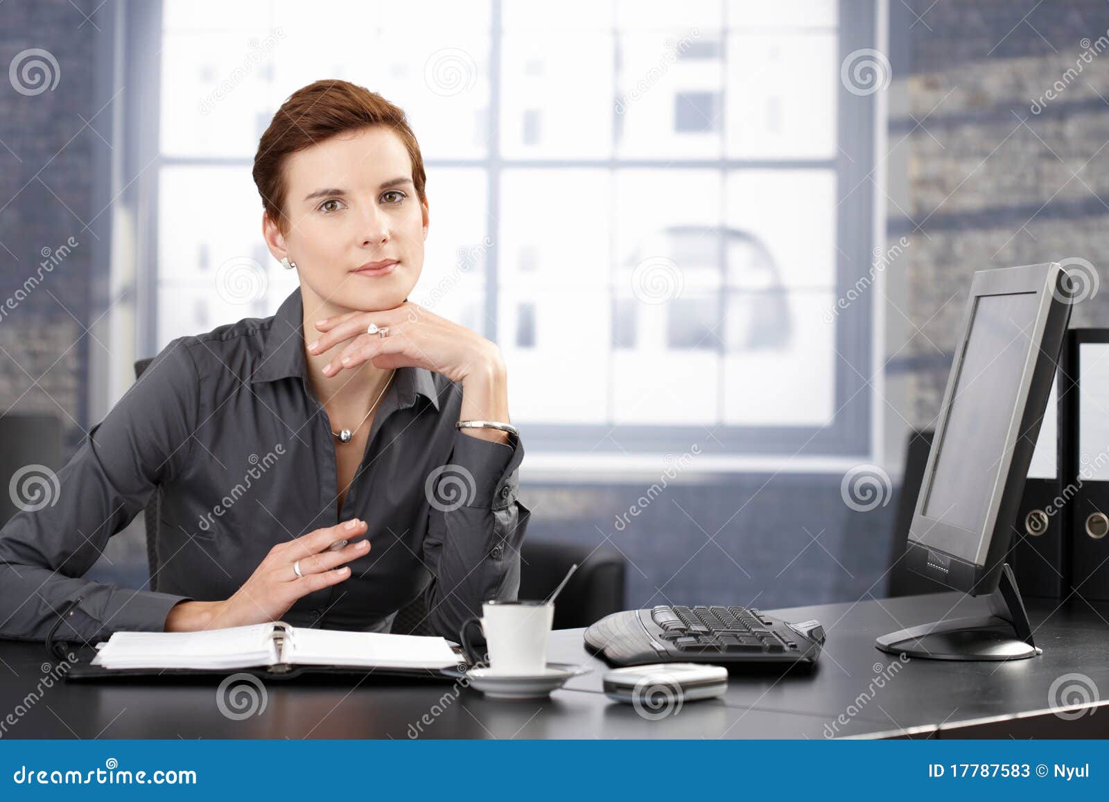 Smiling Businesswoman at Desk Stock Image - Image of adult, good: 17787583