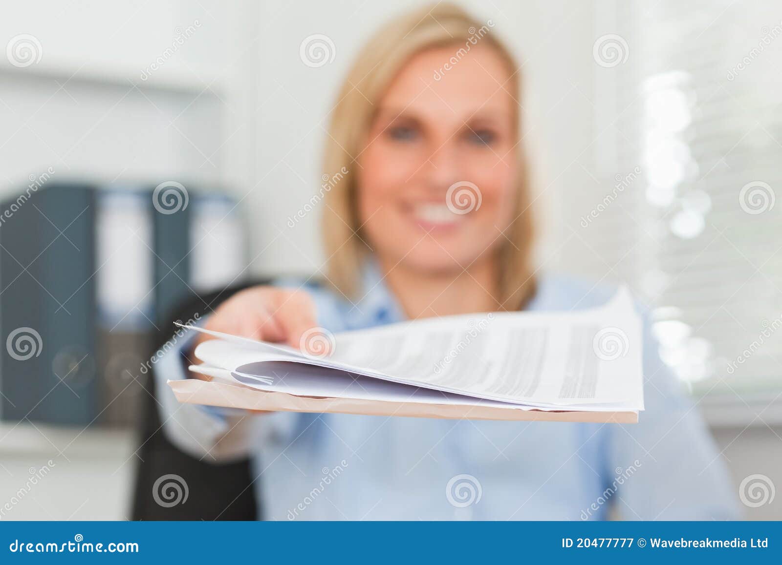 Smiling Businesswoman Passing a Paper Stock Image - Image of smiling ...