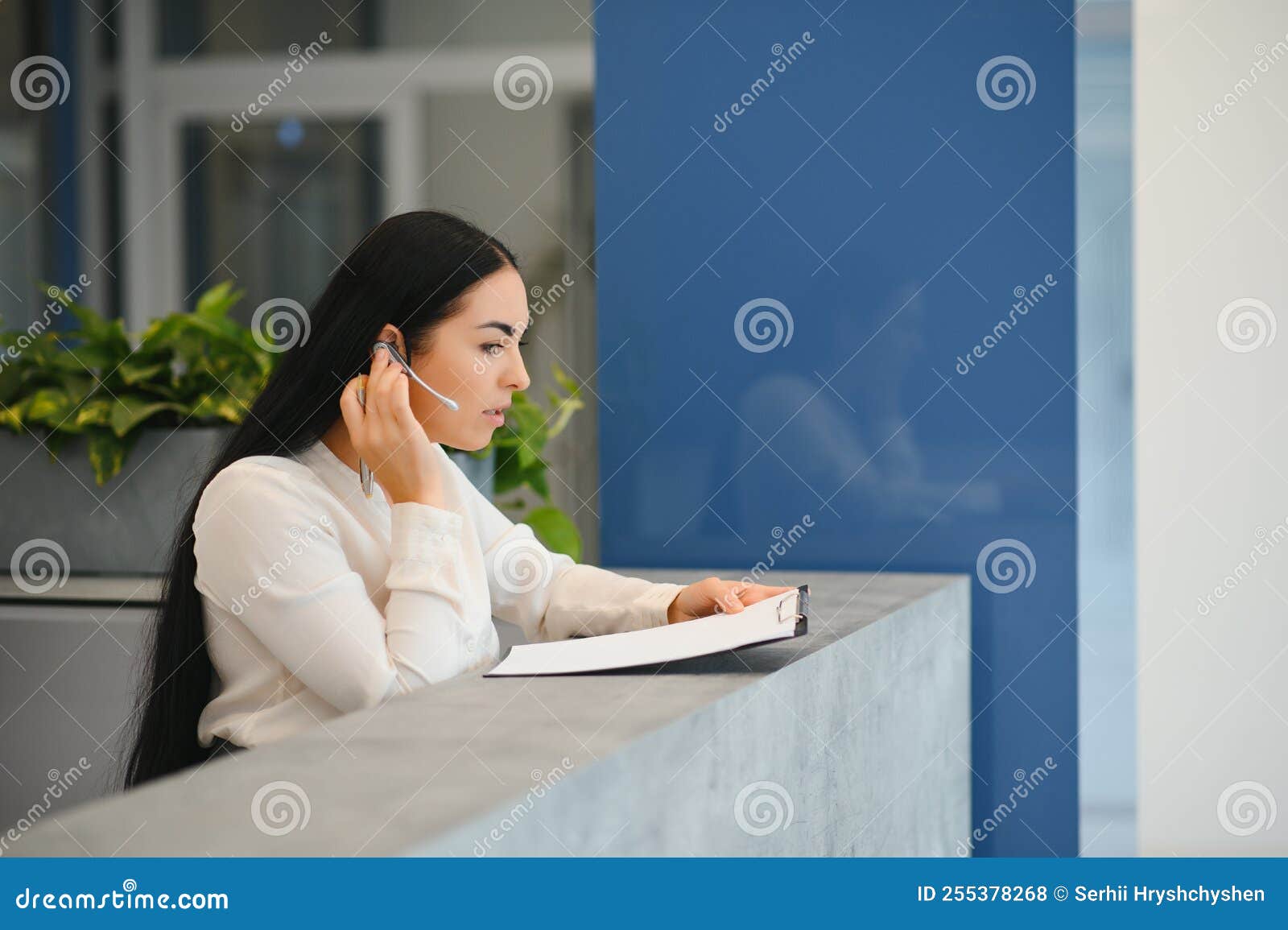 Smiling Businesswoman at the Reception. Stock Photo - Image of employee ...