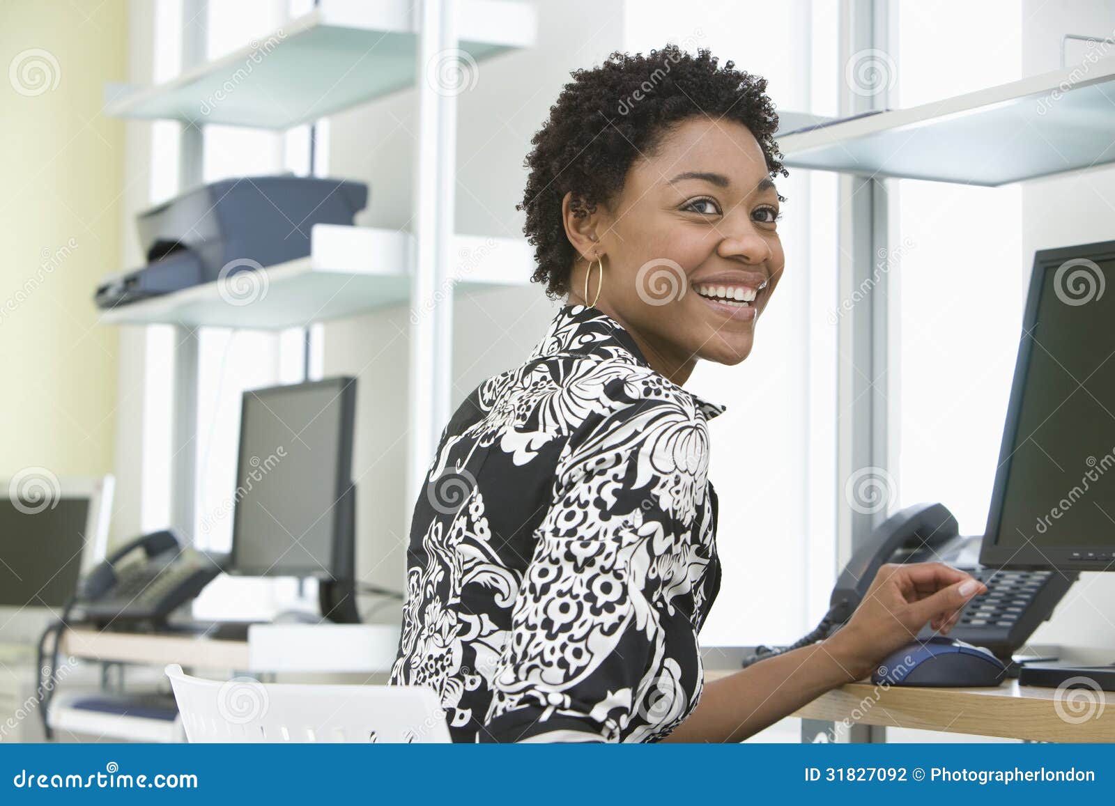 Smiling Businesswoman Using Computer in Office Stock Photo - Image of ...