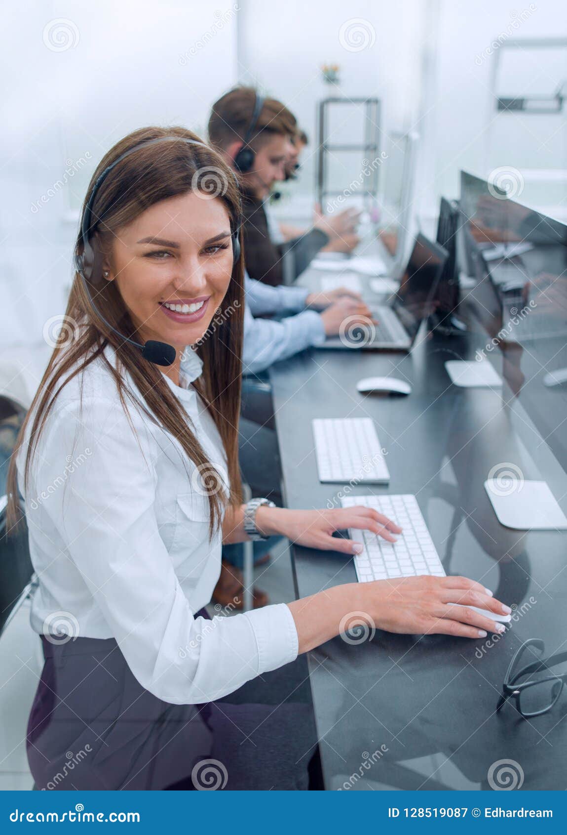 Smiling Call Center Employee in the Workplace Stock Image - Image of ...