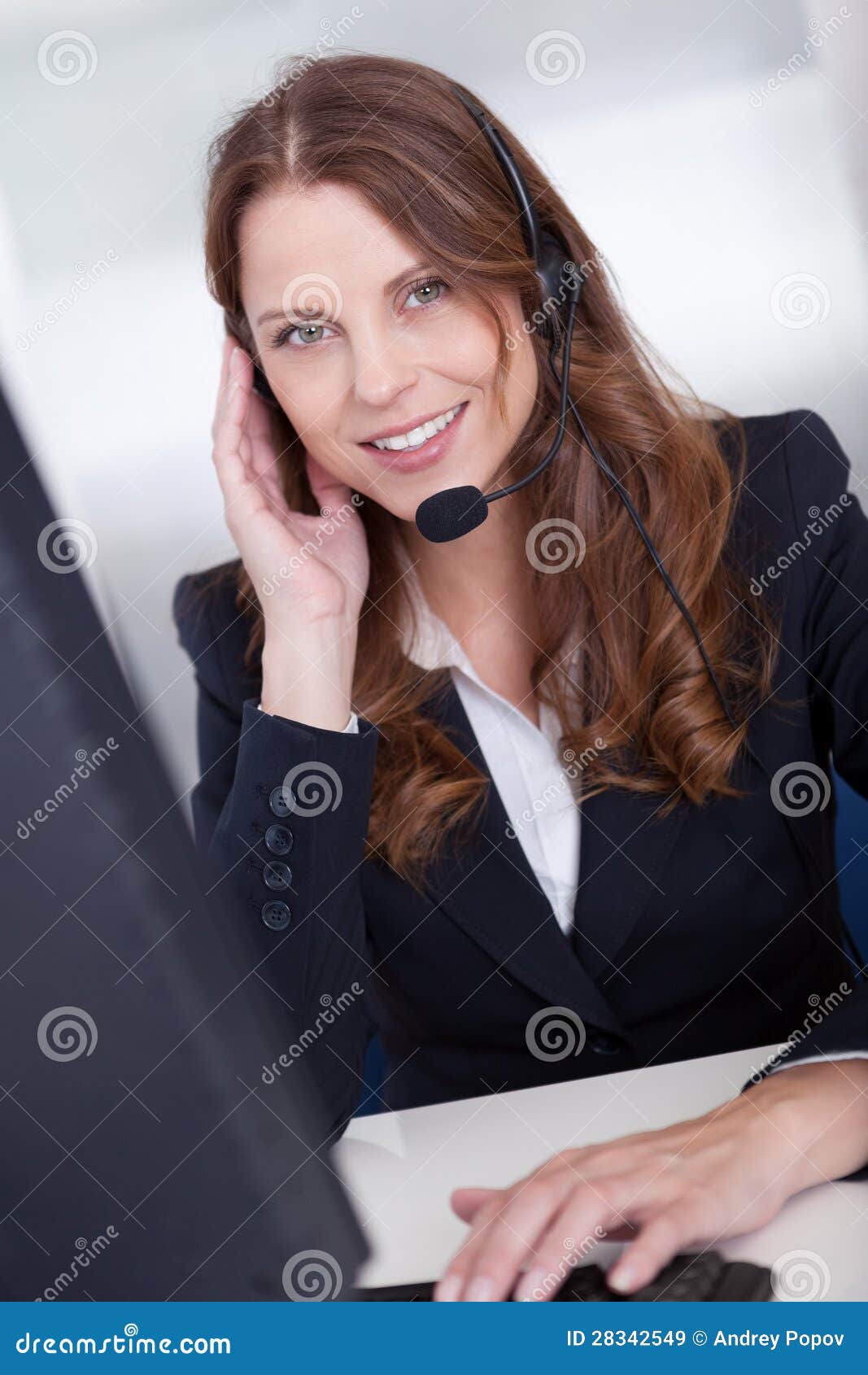 Smiling Call Center Worker Sitting Typing Stock Image - Image of ...