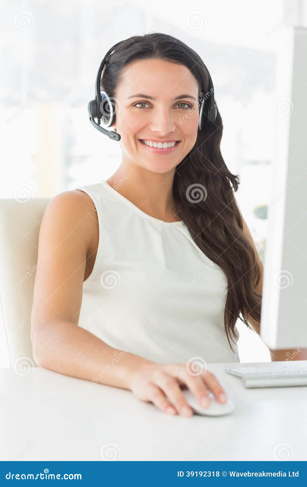 Smiling Call Centre Agent Sitting at Her Desk Stock Photo - Image of ...