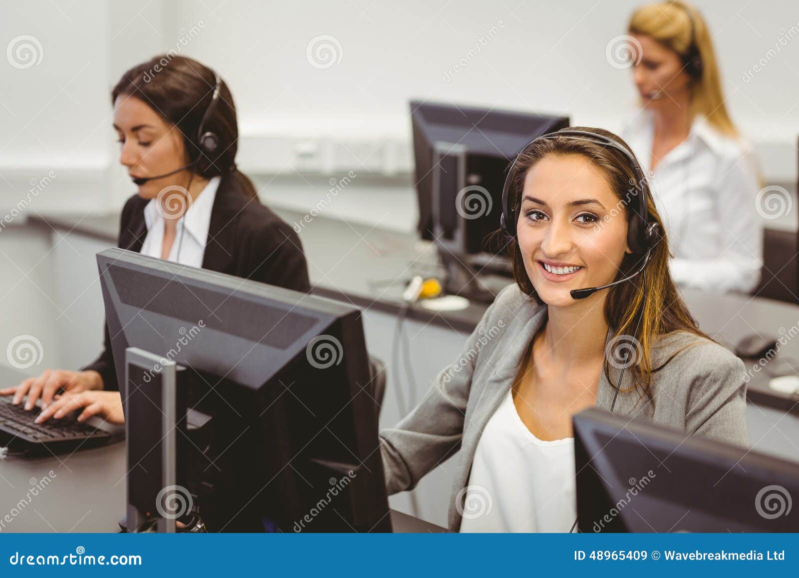 Smiling Call Centre Agent Talking on the Headset Stock Image - Image of ...
