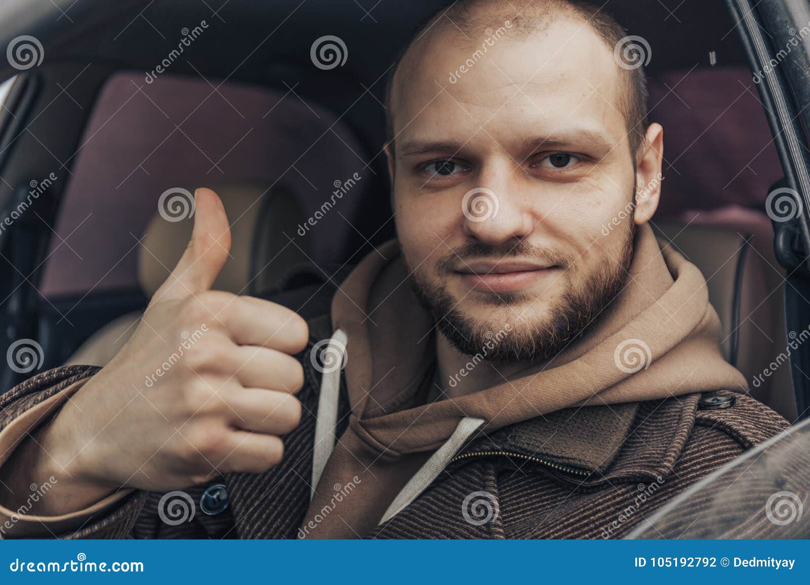 Smiling Calm Man Sitting Inside Car Showing Thumbs Up. Positive Driver ... Smiling Calm Man Sitting Inside Car Showing Thumbs Up. Positive Driver ...