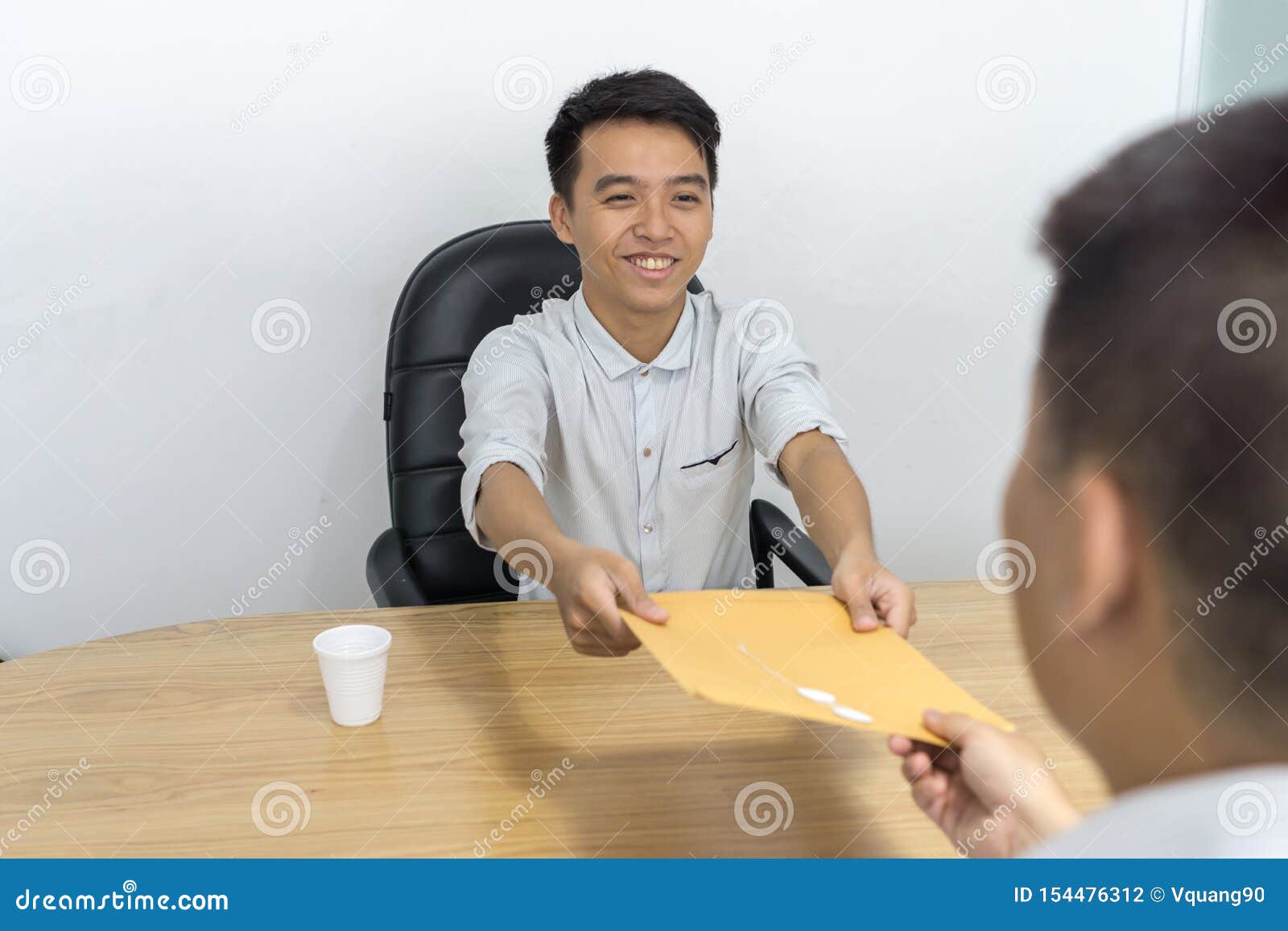 Smiling Candidate Give CV To the Manager in the Job Interview Stock ...