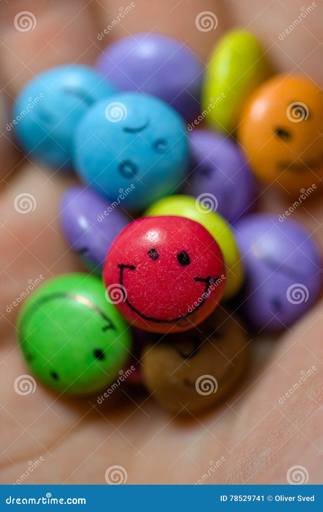 Smiling candy in hands stock image. Image of balls, flavor - 78529741