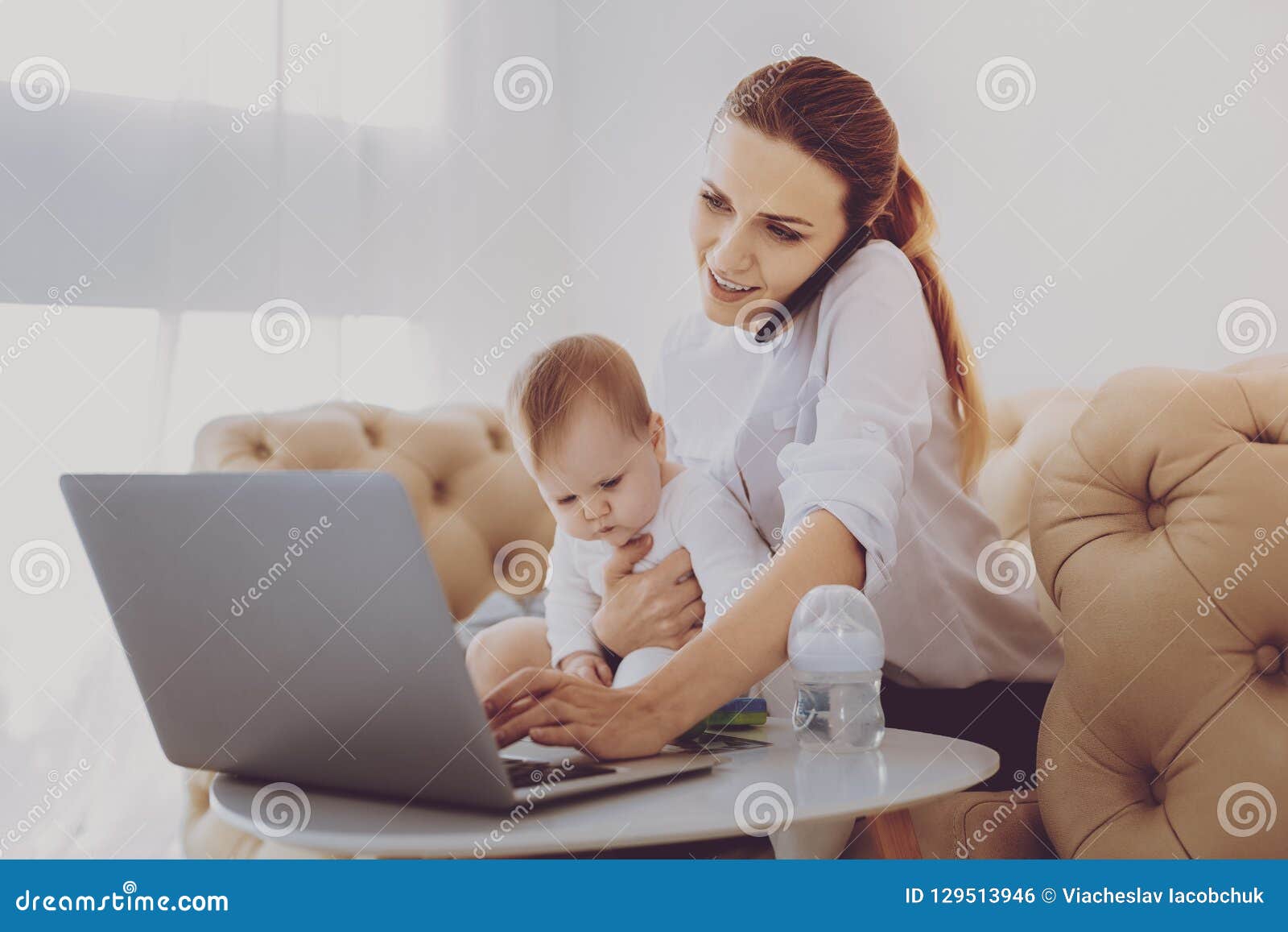 Smiling Caring Mother Calling Her Husband Asking for Help with Baby ...