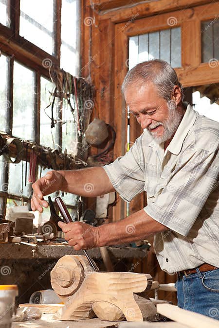 Smiling carpenter stock image. Image of carpenter, sculpting - 23062537