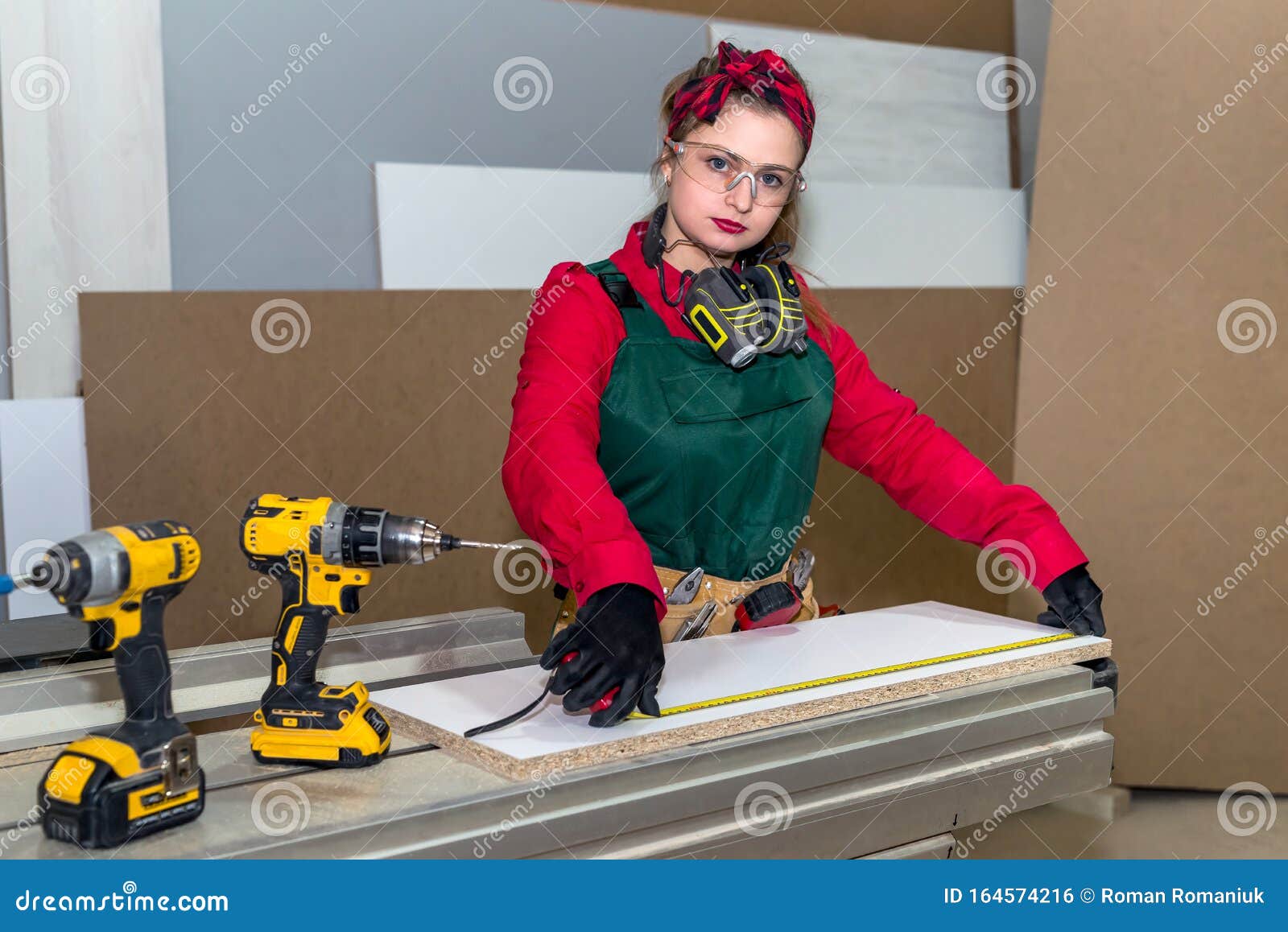 Smiling Carpenter Measuring Wooden Plank by Meter Stock Photo - Image ...