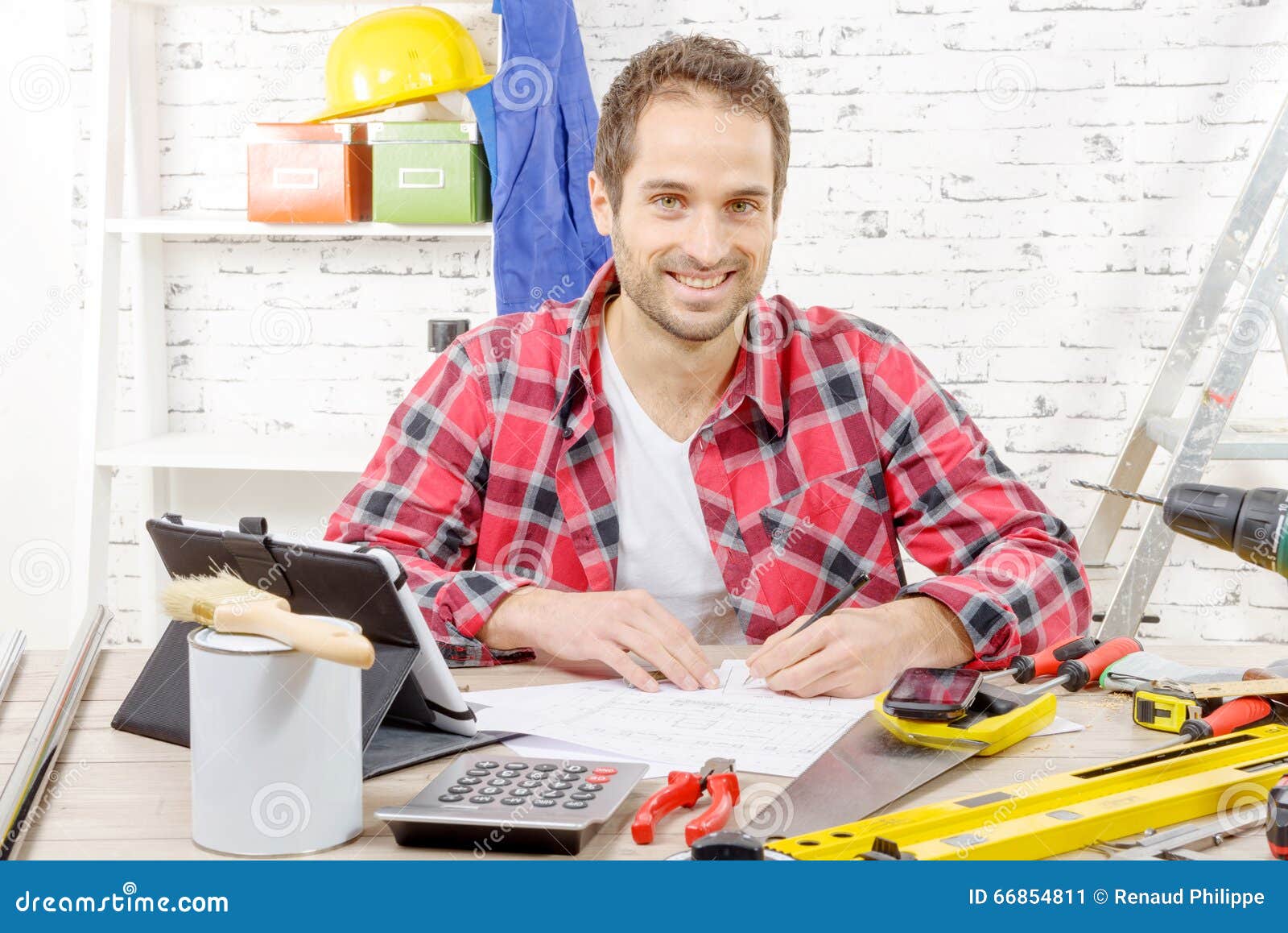 Smiling Carpenter Sitting at the Desk, in His Studio Stock Image ...