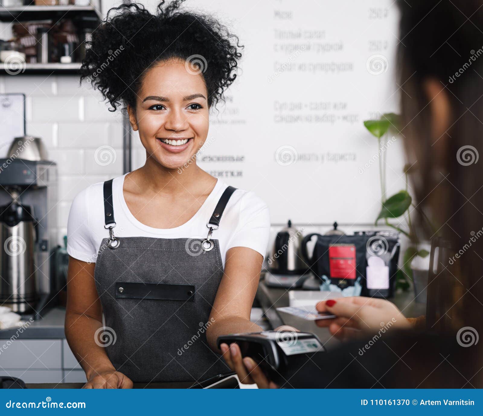 Smiling Cashier Girl In Red And Yellow Uniform Royalty-Free Stock Image ...
