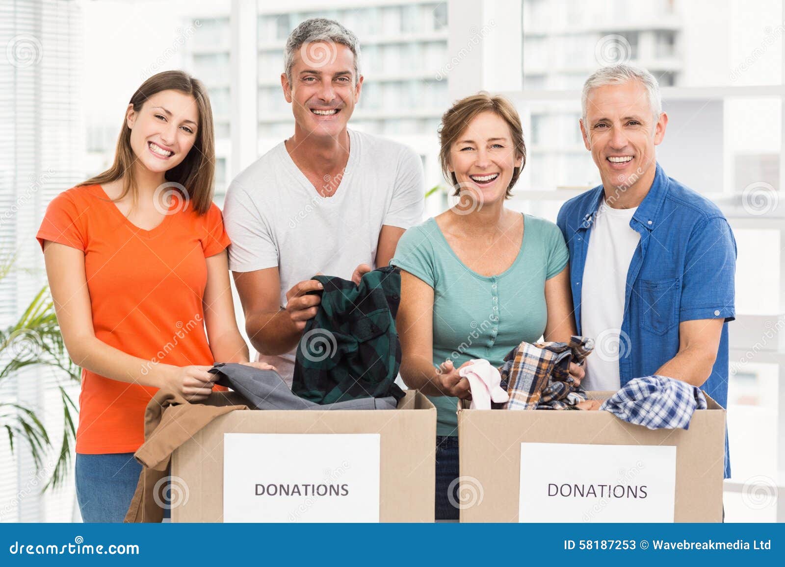 Smiling Casual Business People Sorting Donation Boxes Stock Image ...