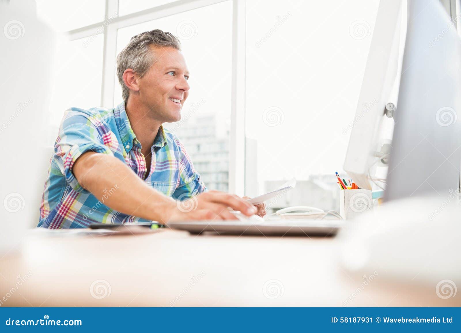 Smiling Casual Designer Working with Computer Stock Image - Image of ...