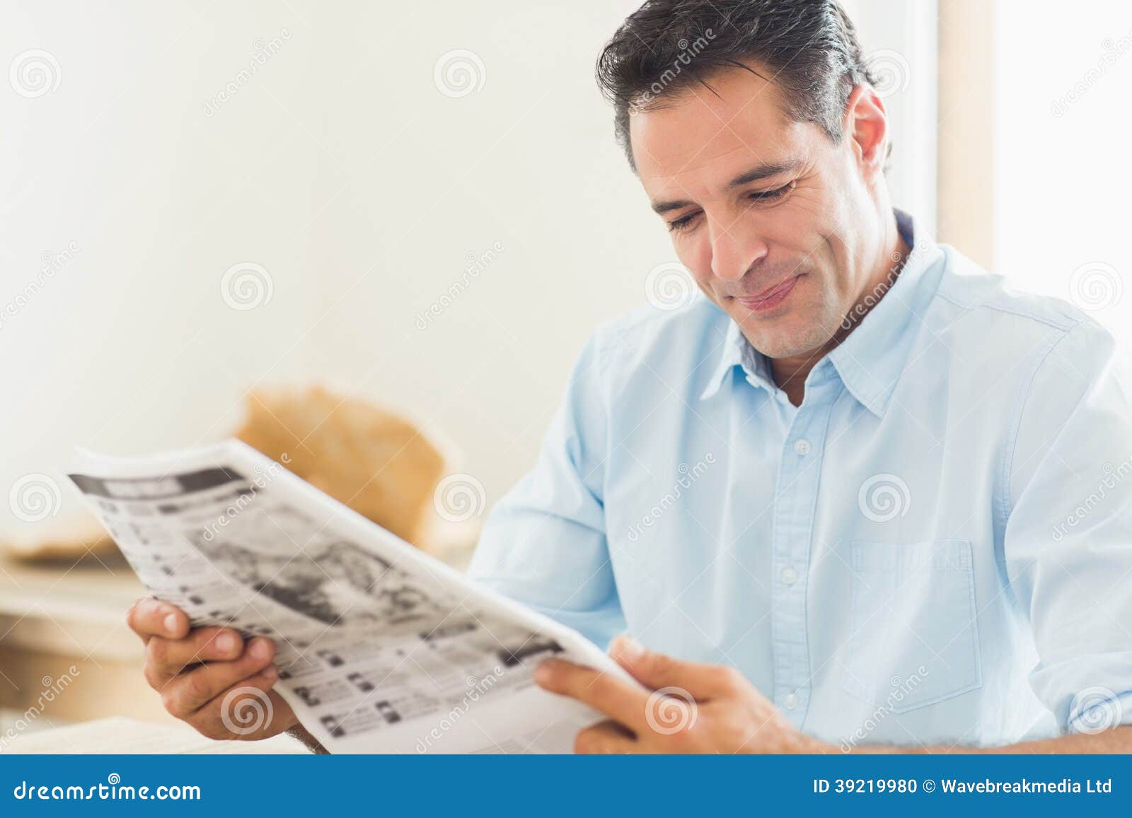 Smiling Casual Man Reading Newspaper in Kitchen Stock Photo - Image of ...