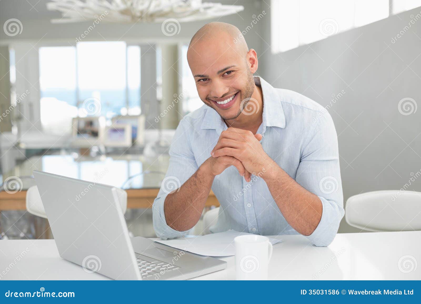 Smiling Casual Man Using Laptop at Home Stock Photo - Image of smart ...