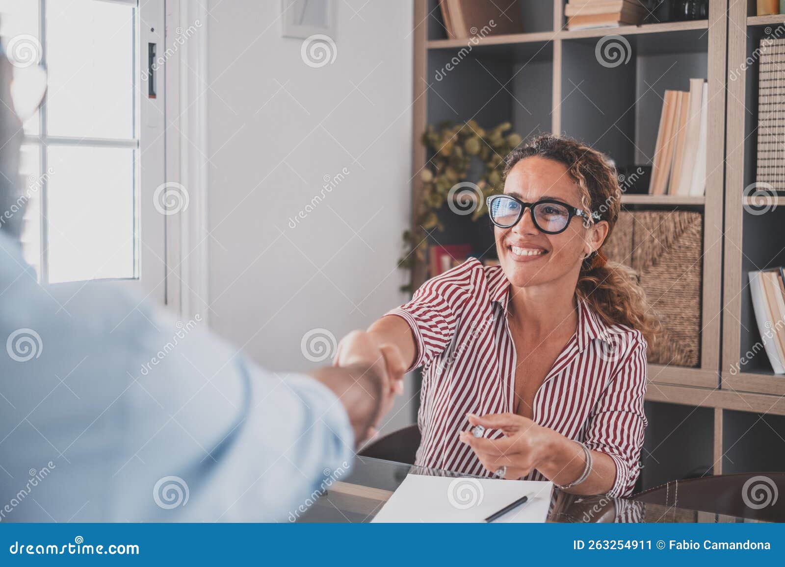 Smiling Caucasian Female Hr Manager Handshake Hire Male Candidate At ... Smiling Caucasian Female Hr Manager Handshake Hire Male Candidate At ...