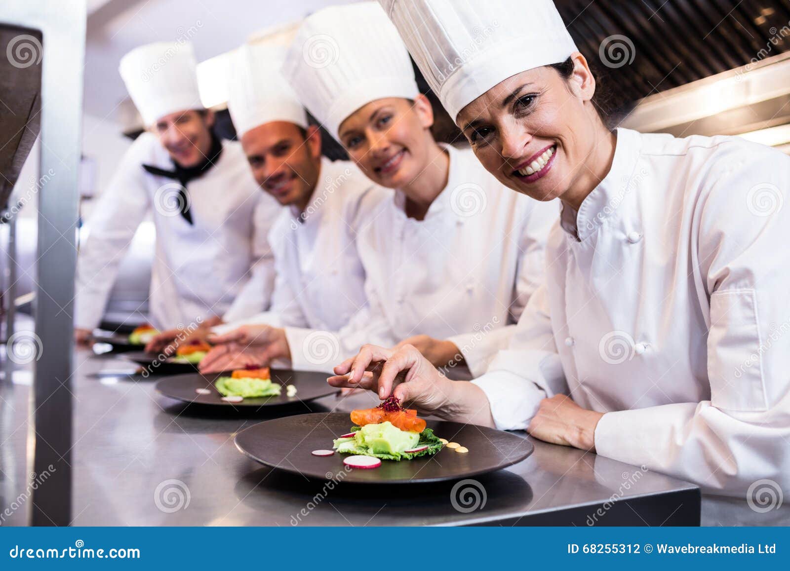 Smiling Chef while Decorating Food Plate Stock Photo - Image of adult ...