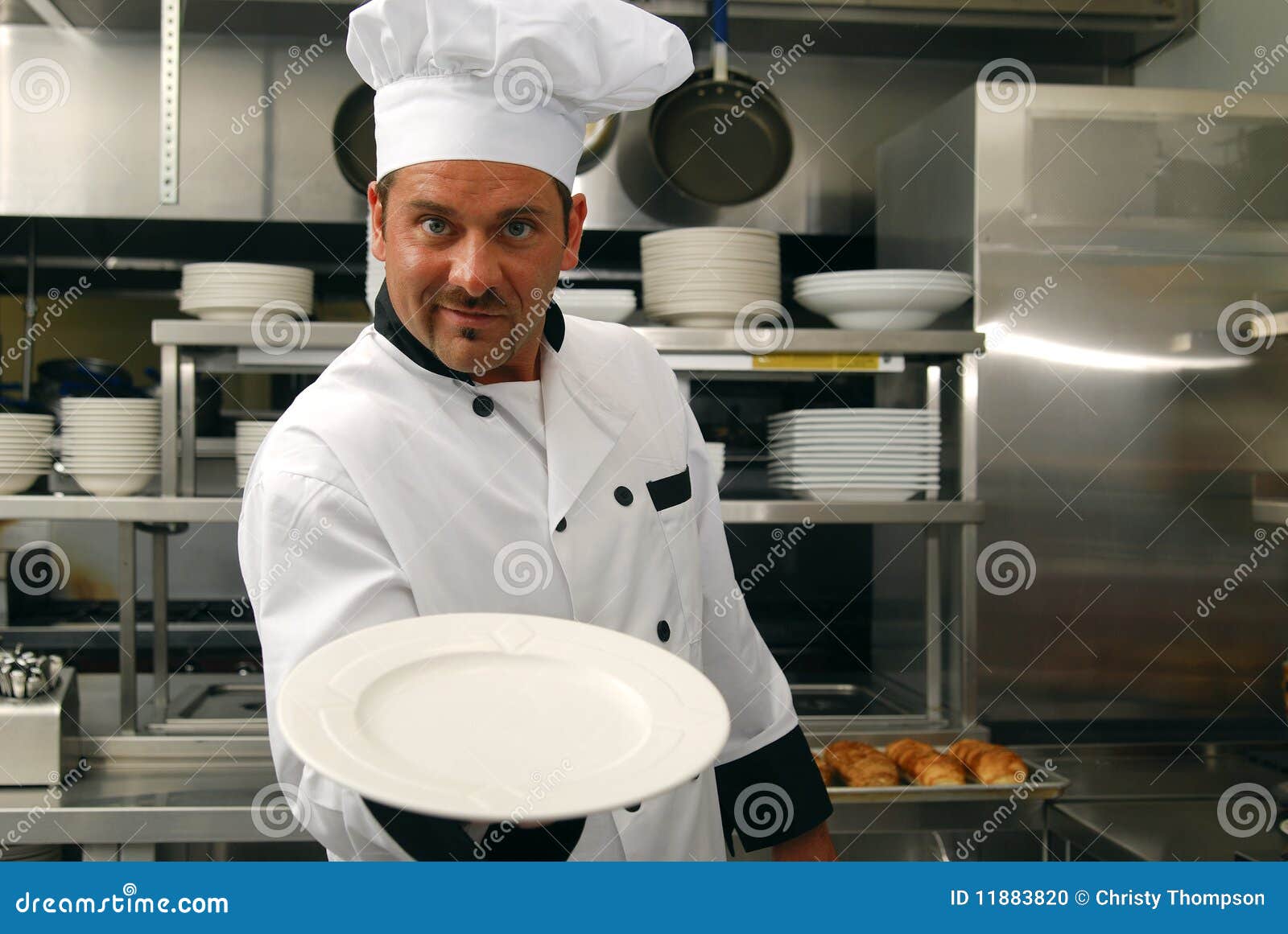Smiling Chef with Empty Plate Stock Photo - Image of smiling, happy ...
