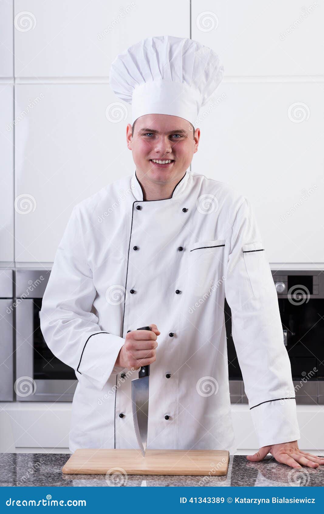 Smiling chef with knife stock image. Image of recipe - 41343389