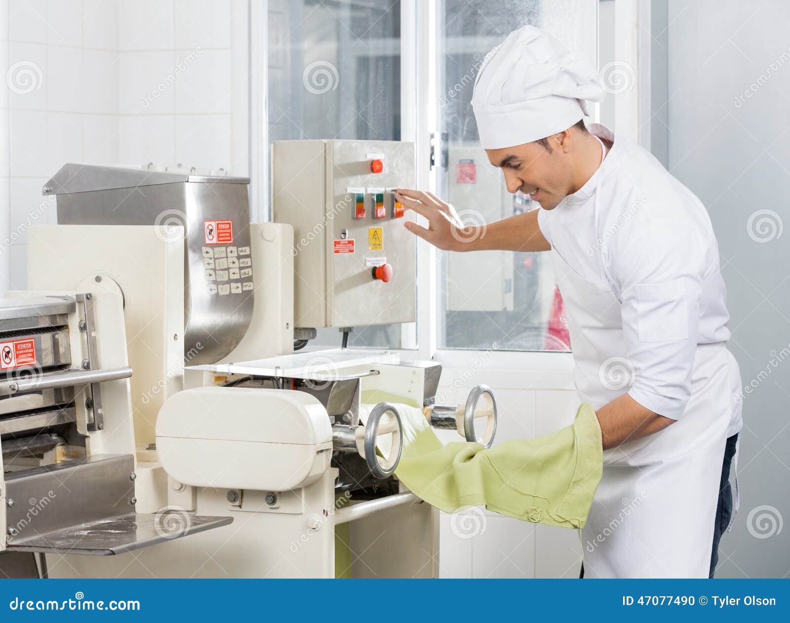 Smiling Chef Operating Spaghetti Pasta Machine Stock Photo - Image of ...