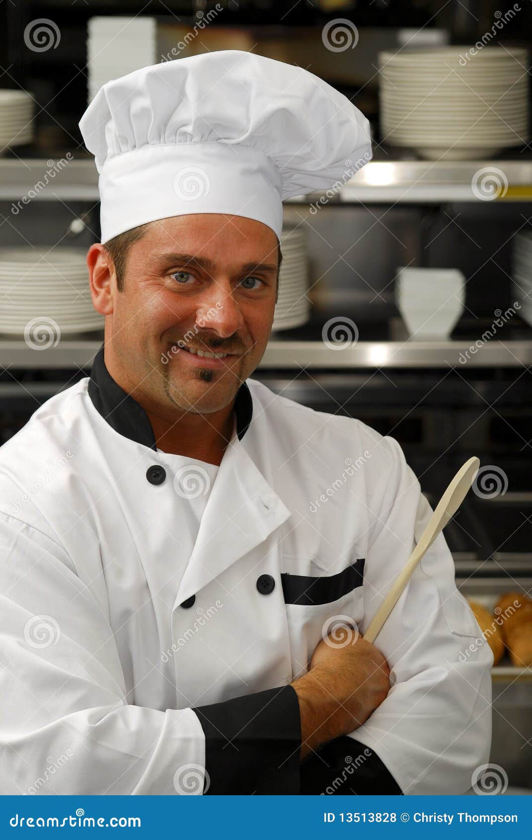 Smiling chef with spoon stock photo. Image of occupation - 13513828