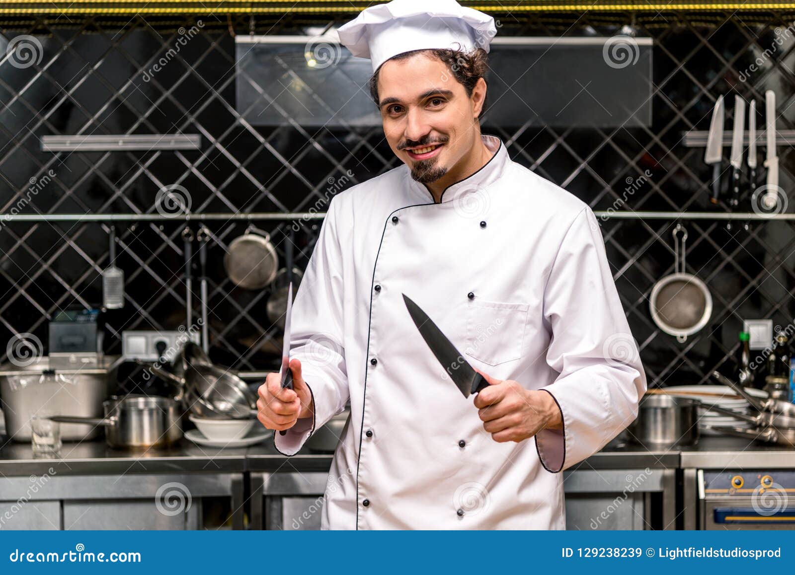 Smiling Chef Standing with Knifes Stock Image - Image of standing, cook ...