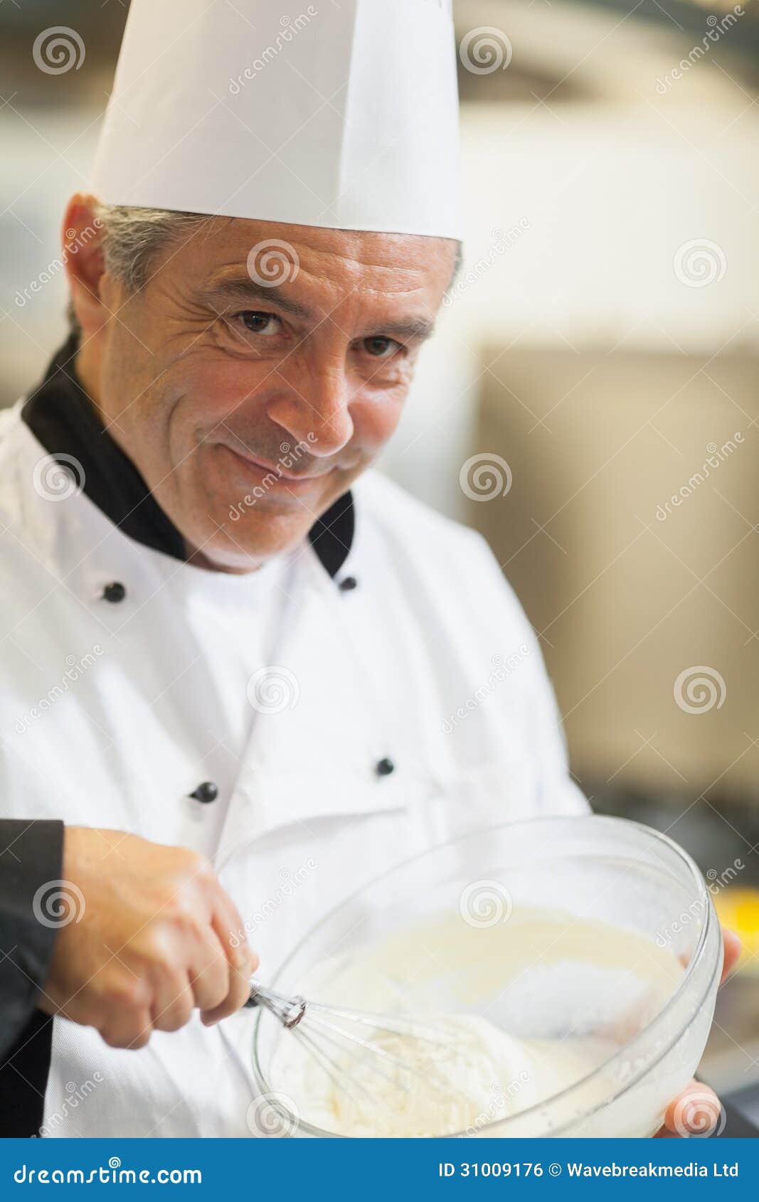 Smiling Chef Whisking Cream Stock Photo - Image of caucasian, standing ...