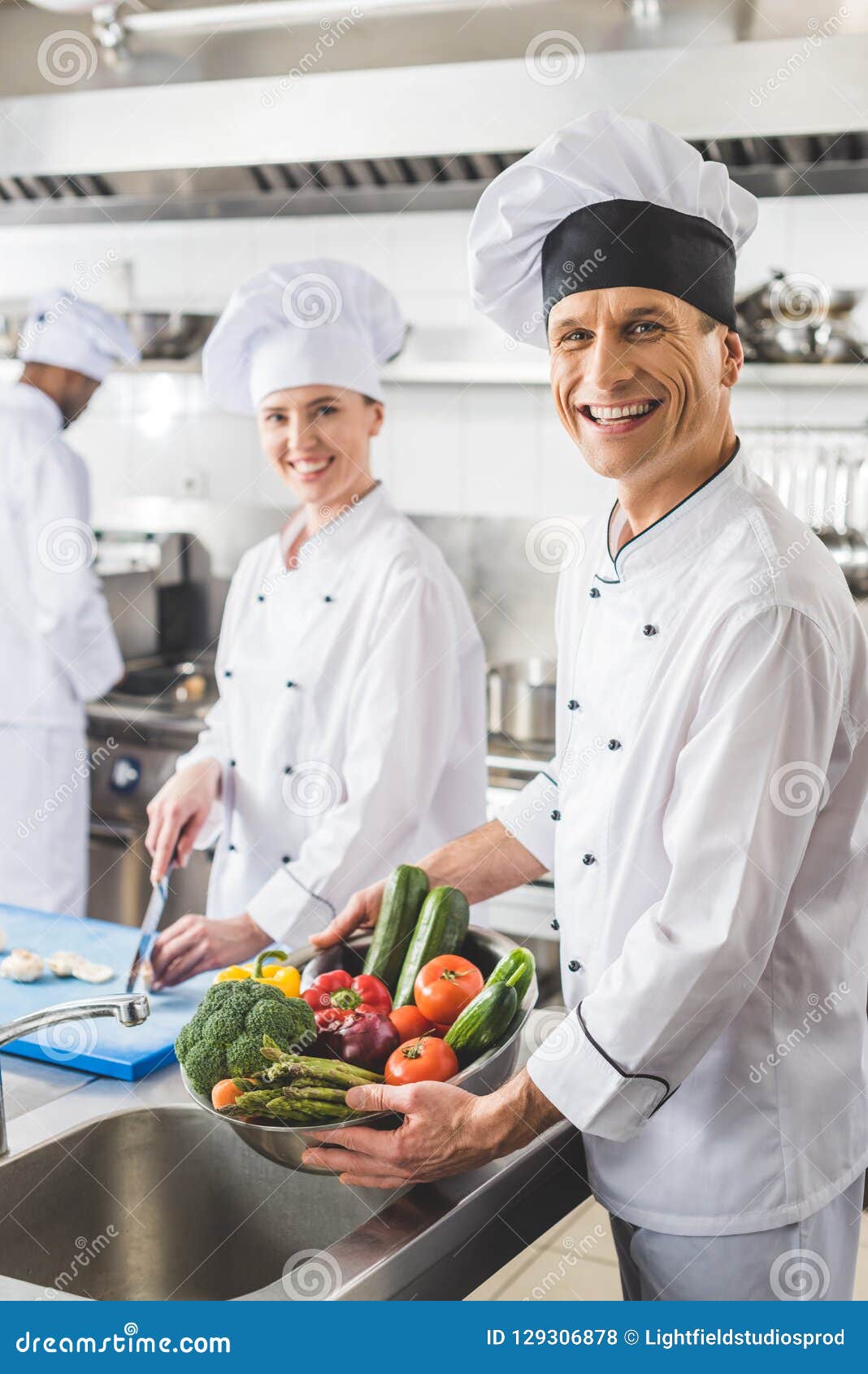 Smiling Chefs Looking at Camera Stock Photo - Image of cafe, blackman ...